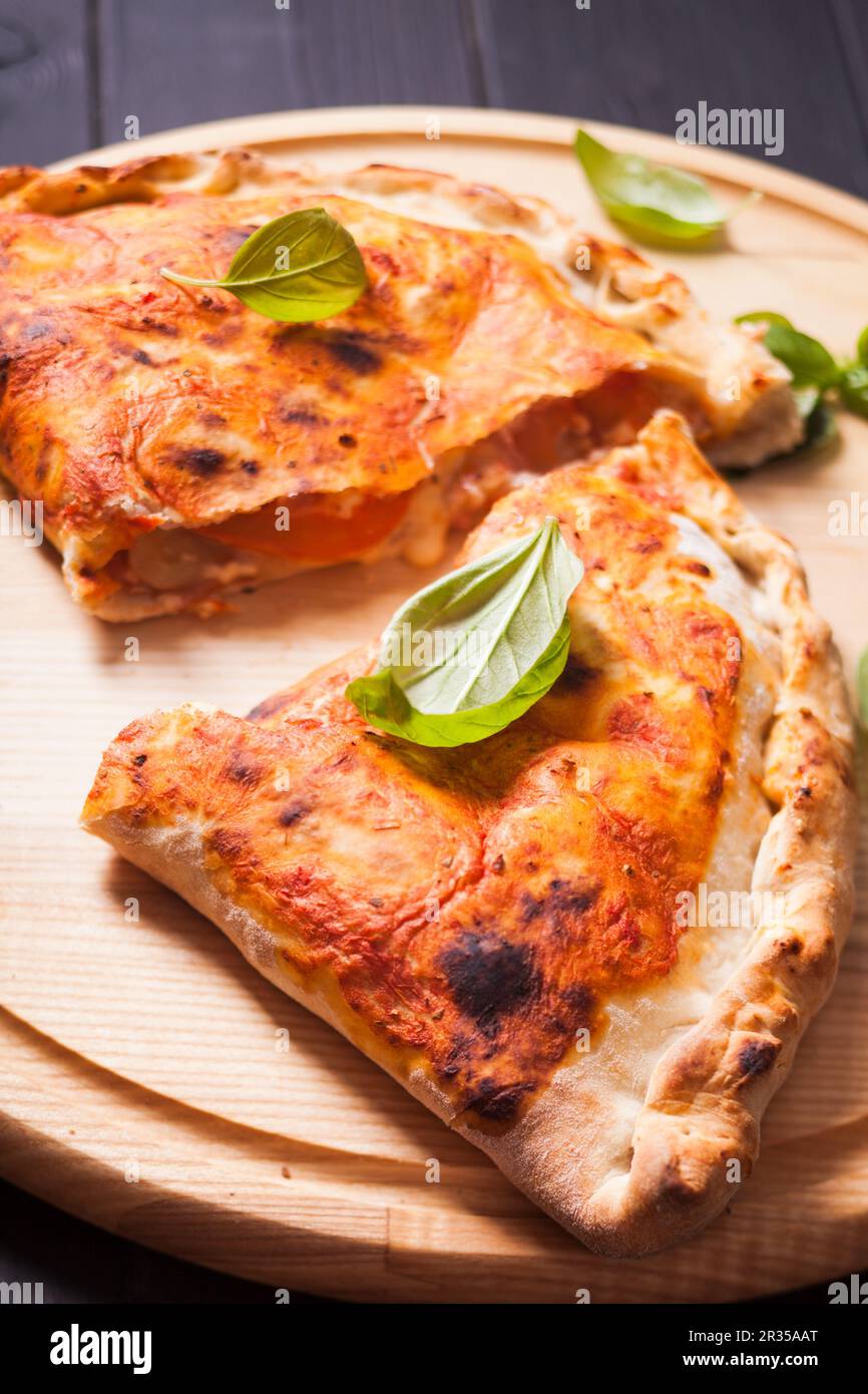 The Pizza calzone Stock Photo - Alamy