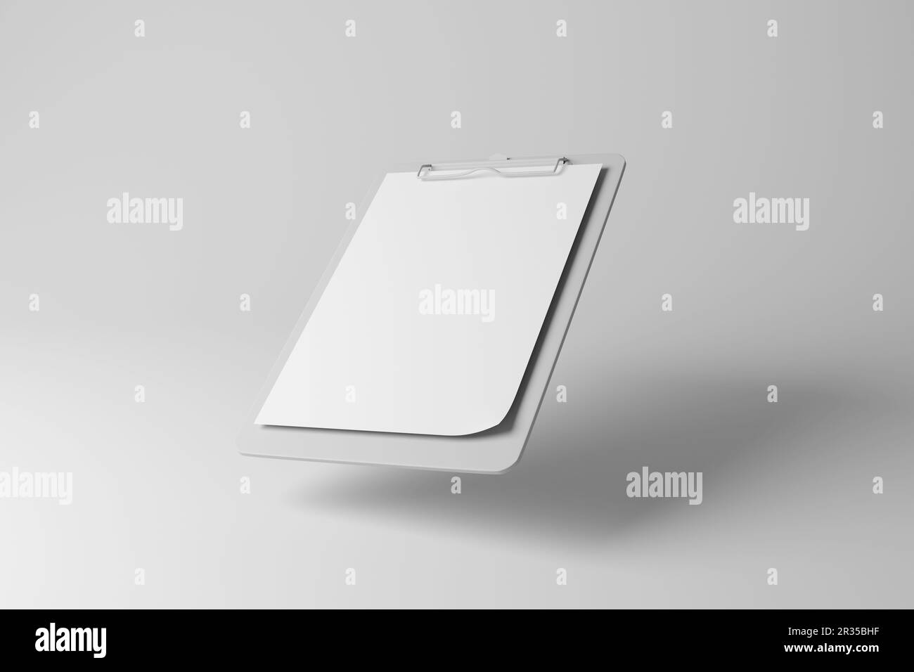 White clipboard floating in mid air with shadow on white background in ...