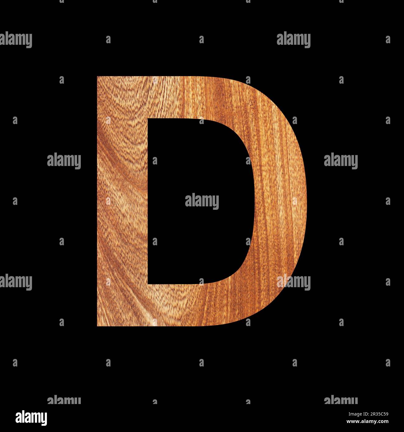 Capital letter D on oak wood background - Black background Stock Photo ...