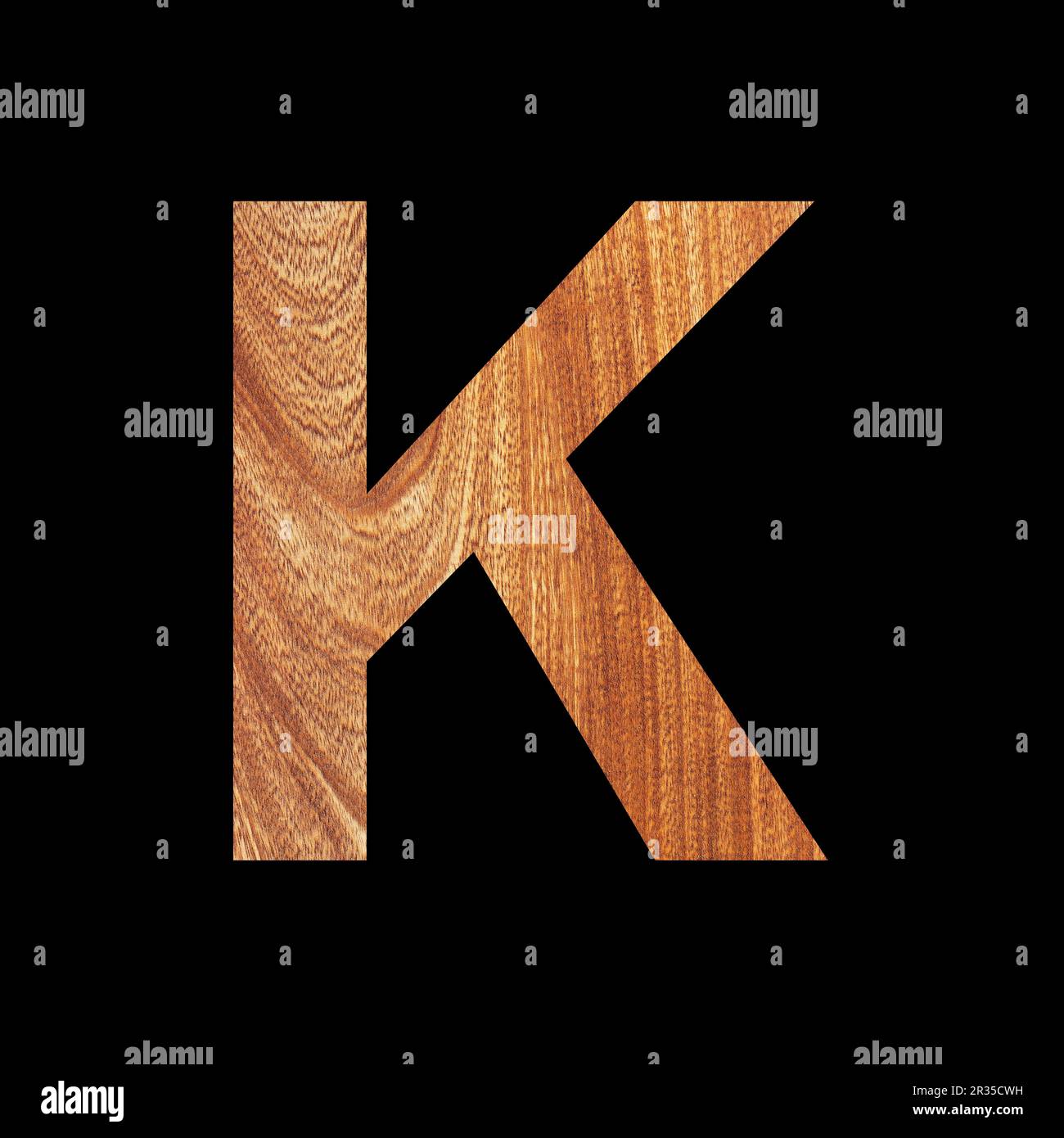 Capital letter K on oak wood background - Black background Stock Photo ...