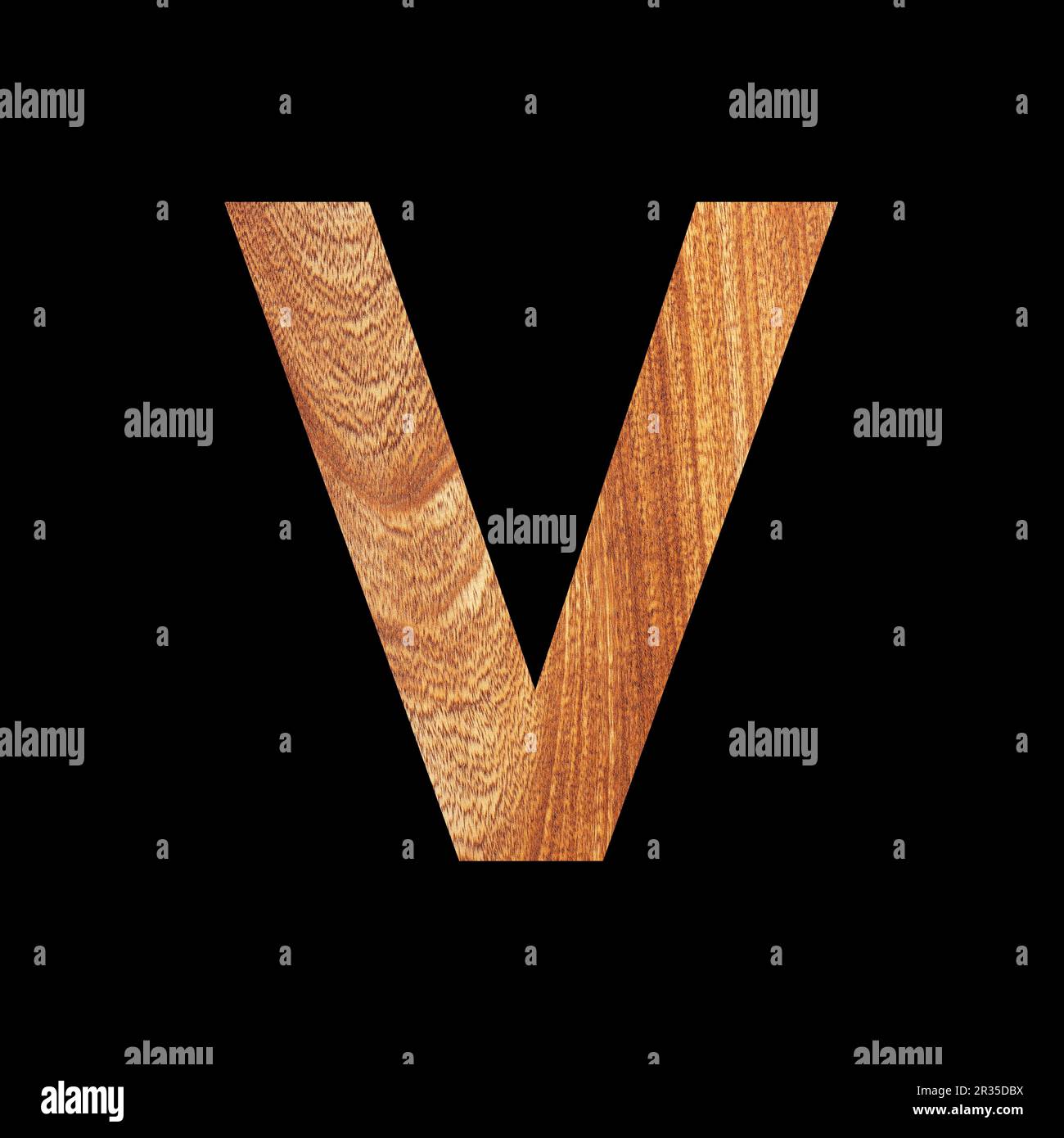 Capital letter V on oak wood background - Black background Stock Photo ...