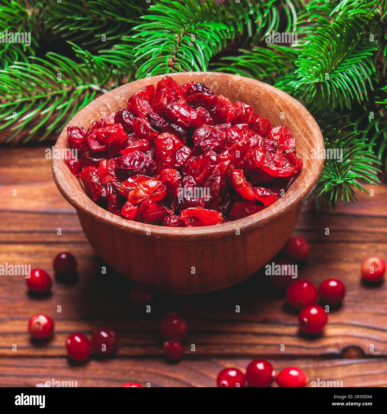 Bowl fresh organic cranberries dried hi-res stock photography and ...