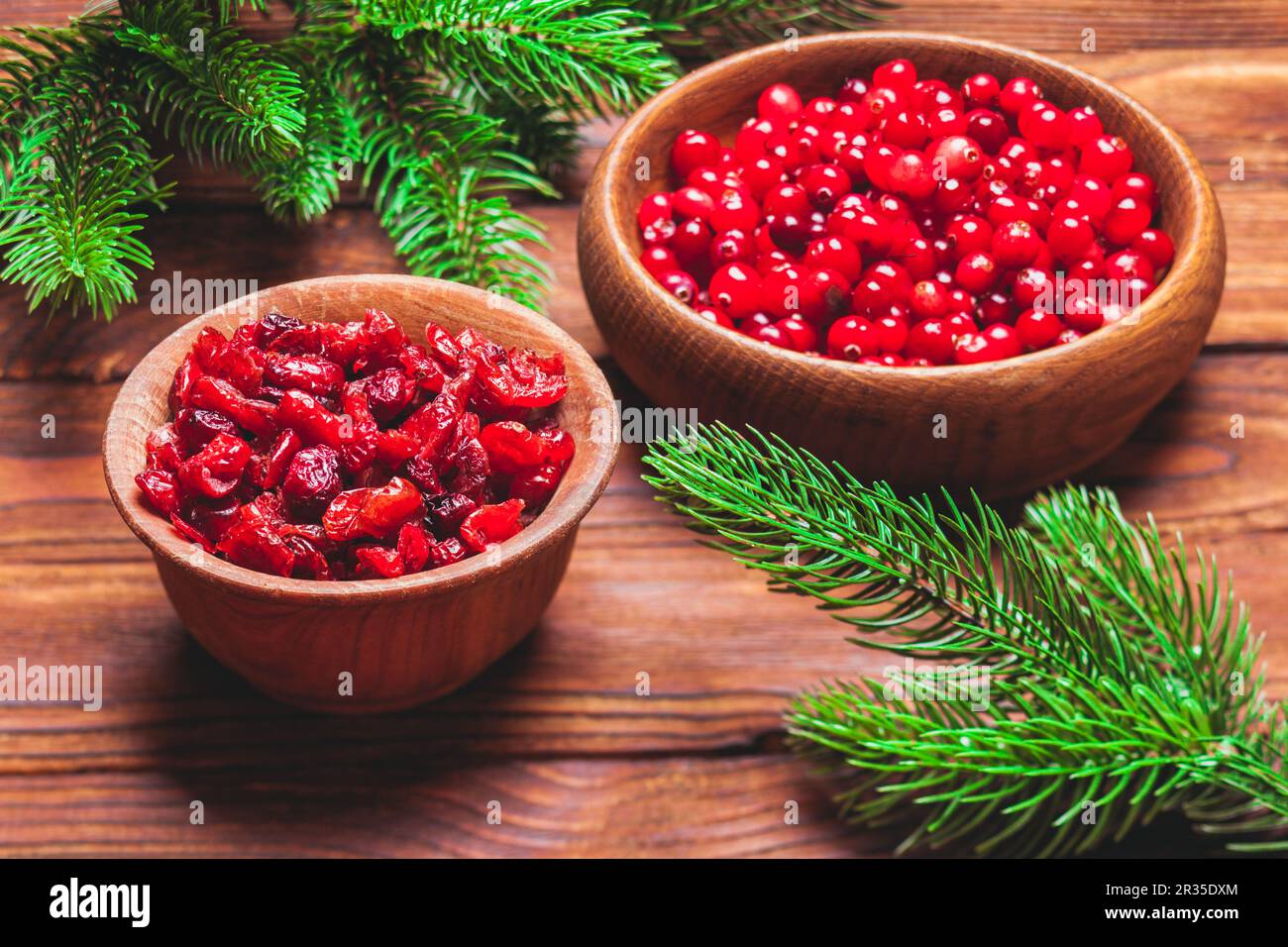 Bowl fresh organic cranberries dried hi-res stock photography and ...