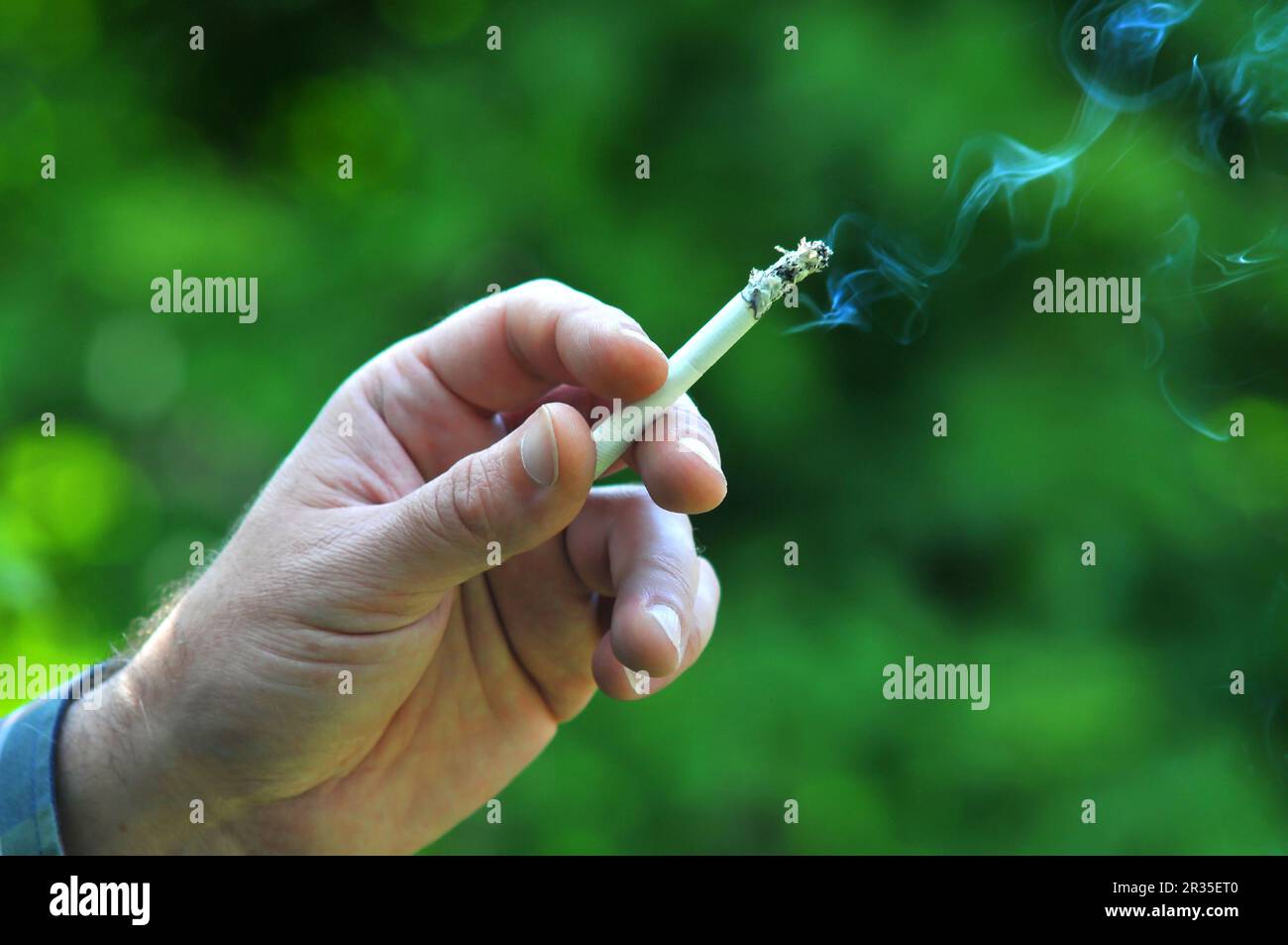 Lit cigarette lighter hi-res stock photography and images - Alamy