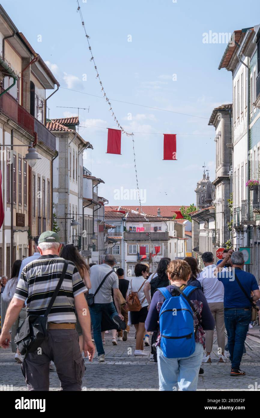Crowded streets in social events in the city of Braga, Braga Romana ...