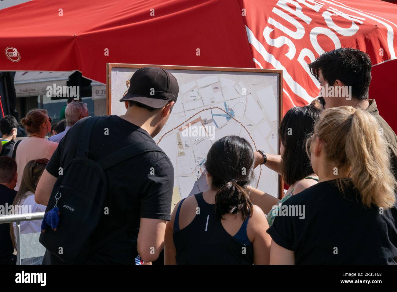 People Looking at maps Stock Photo - Alamy
