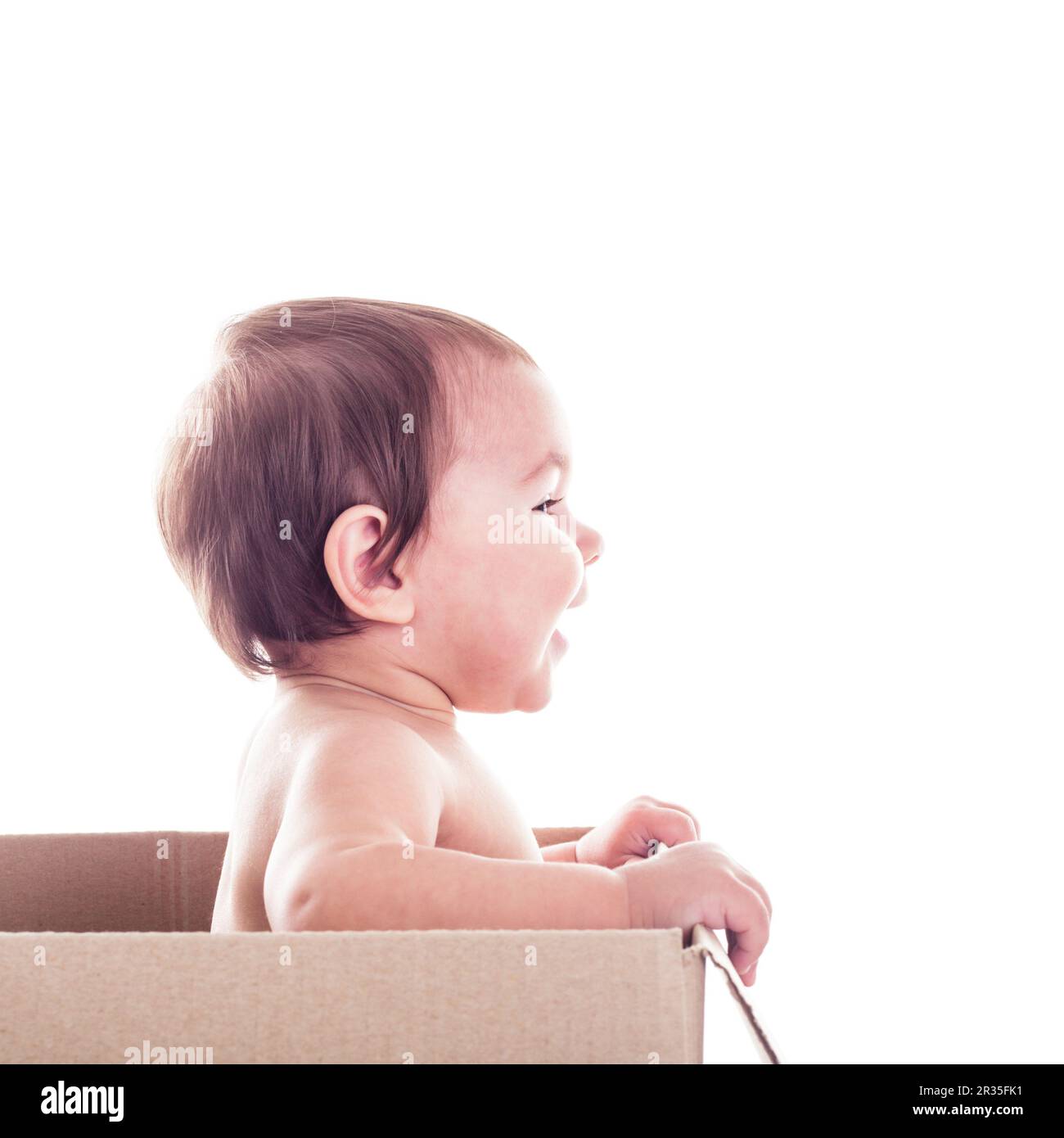 Baby in the box Stock Photo - Alamy