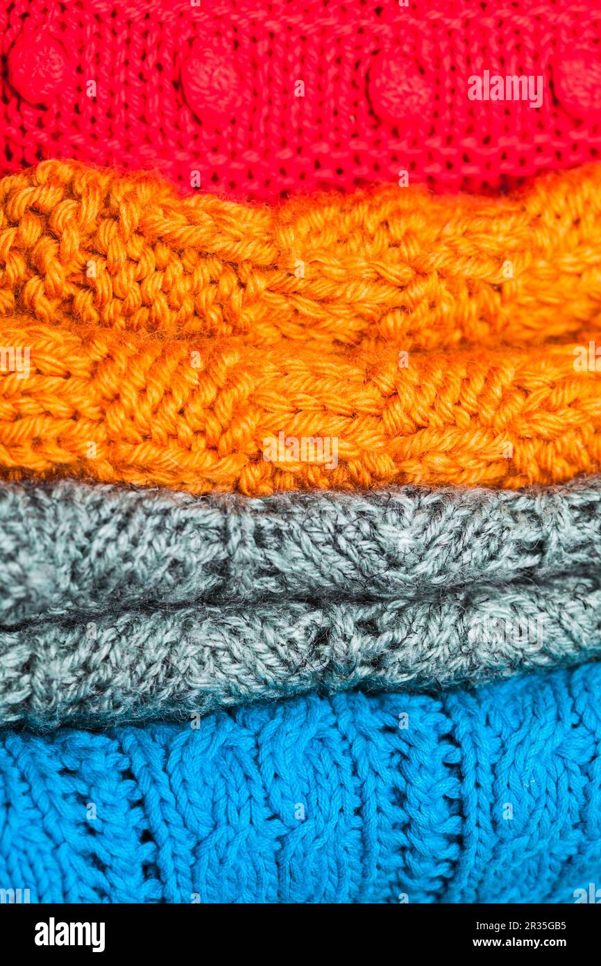 Knitted clothes stack Stock Photo - Alamy