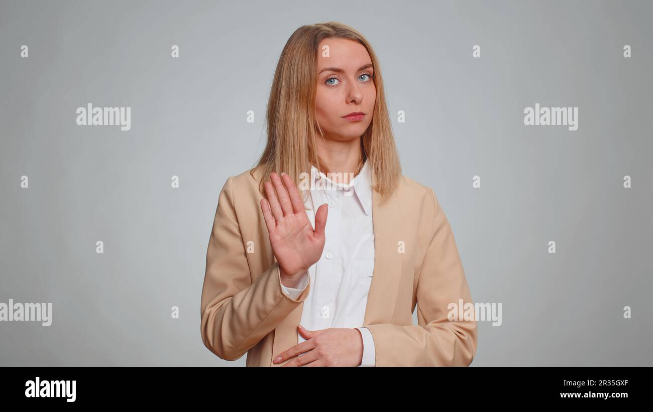 I am not guilty, not my fault. Portrait of young businesswoman pointing ...