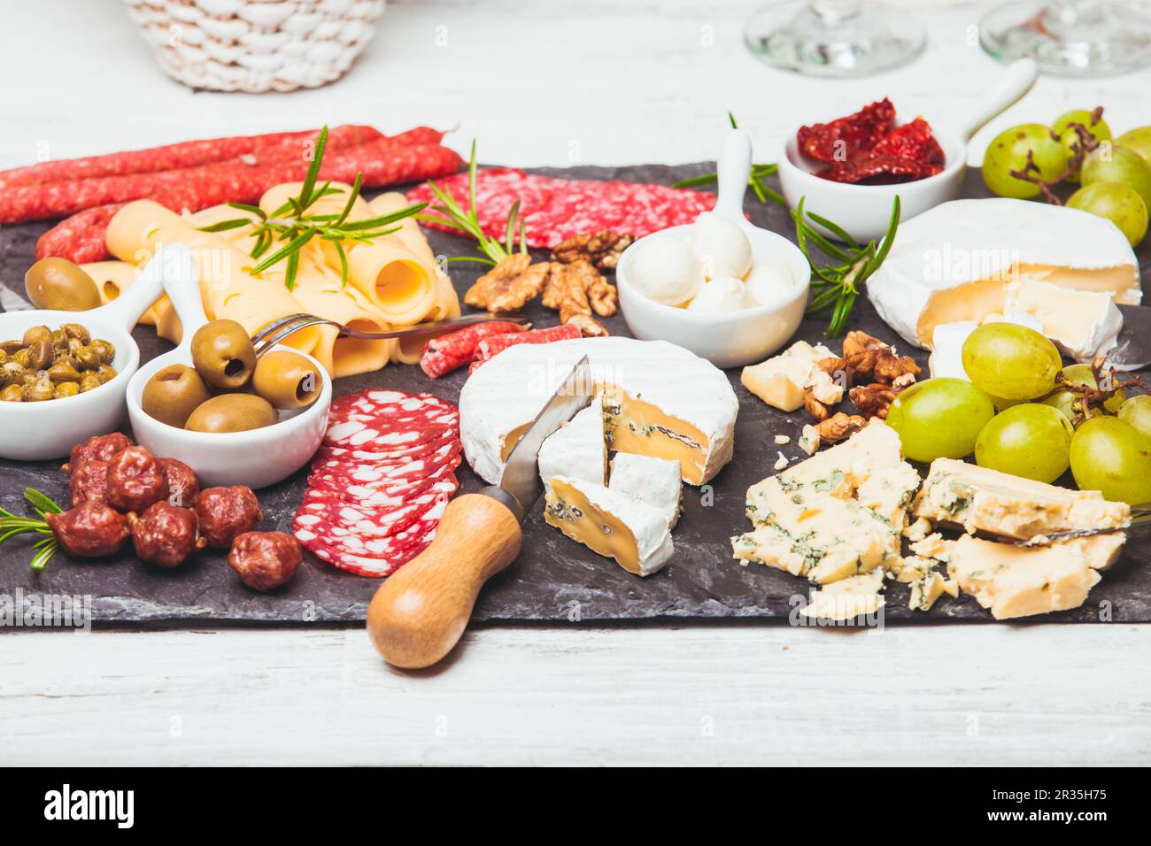 Cheese and salami plate Stock Photo - Alamy
