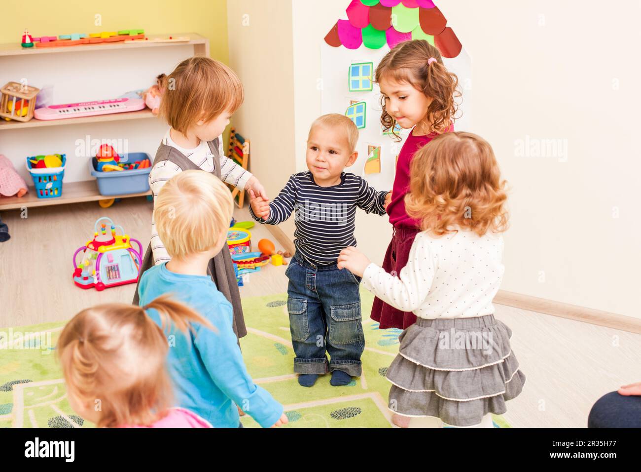Group of little children dancing Stock Photo - Alamy