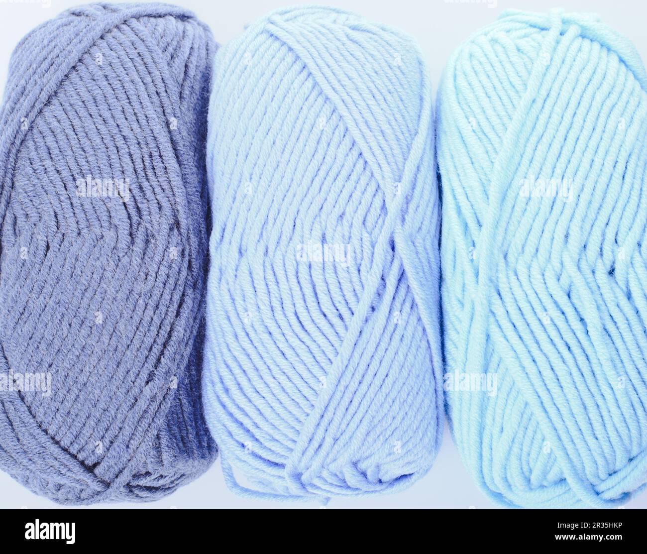 Blue yarn ball Stock Photo - Alamy