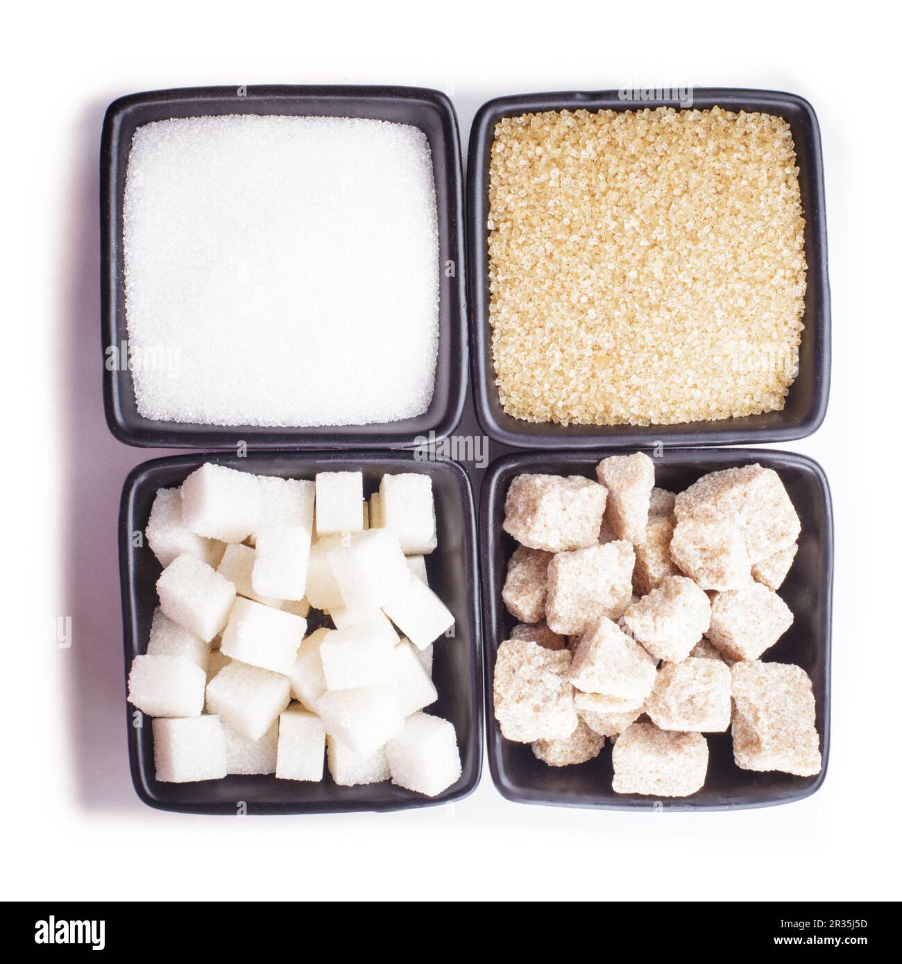 Sugar types on white Stock Photo - Alamy