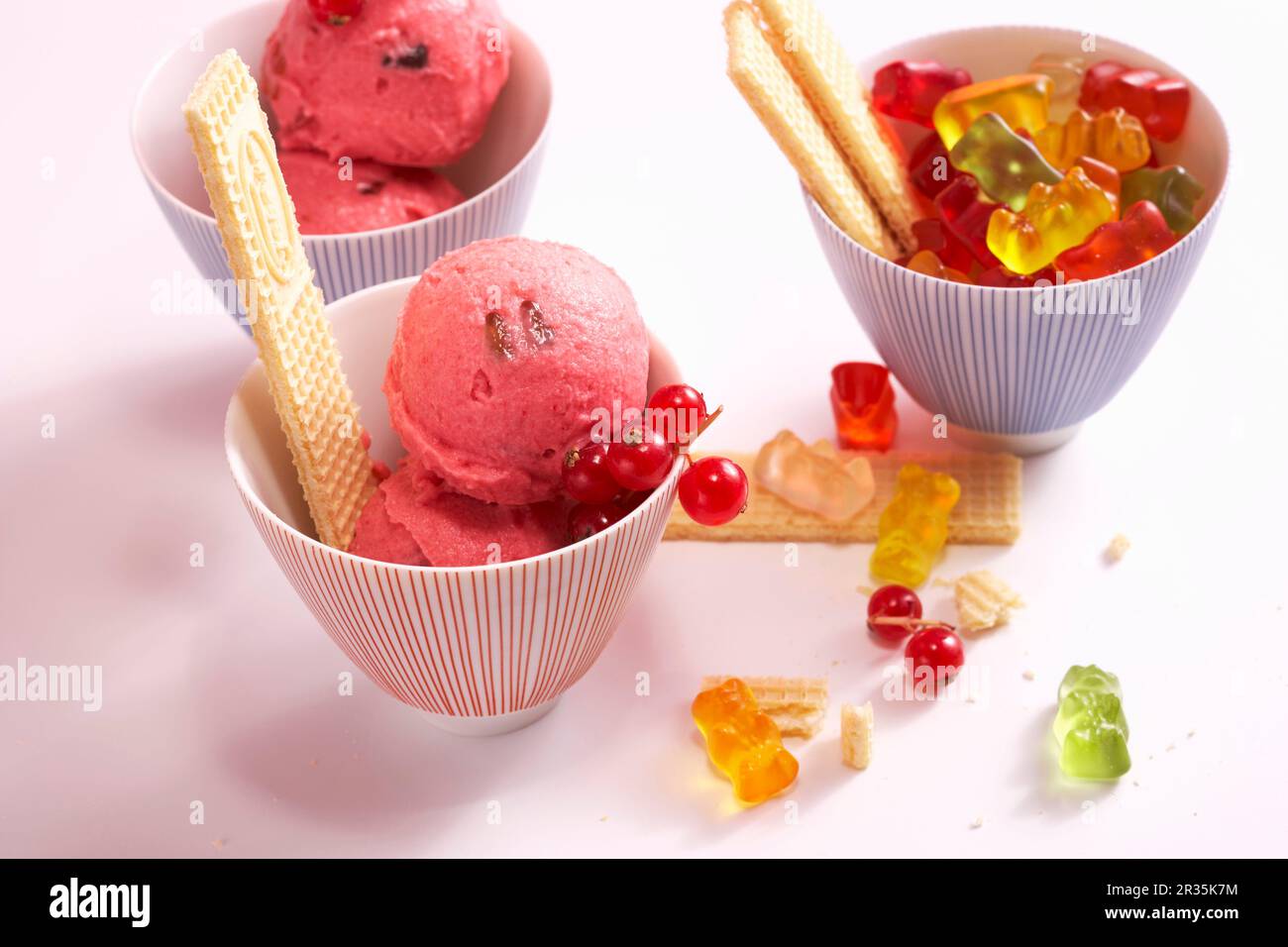 Redcurrant ice cream with gummy bears Stock Photo - Alamy