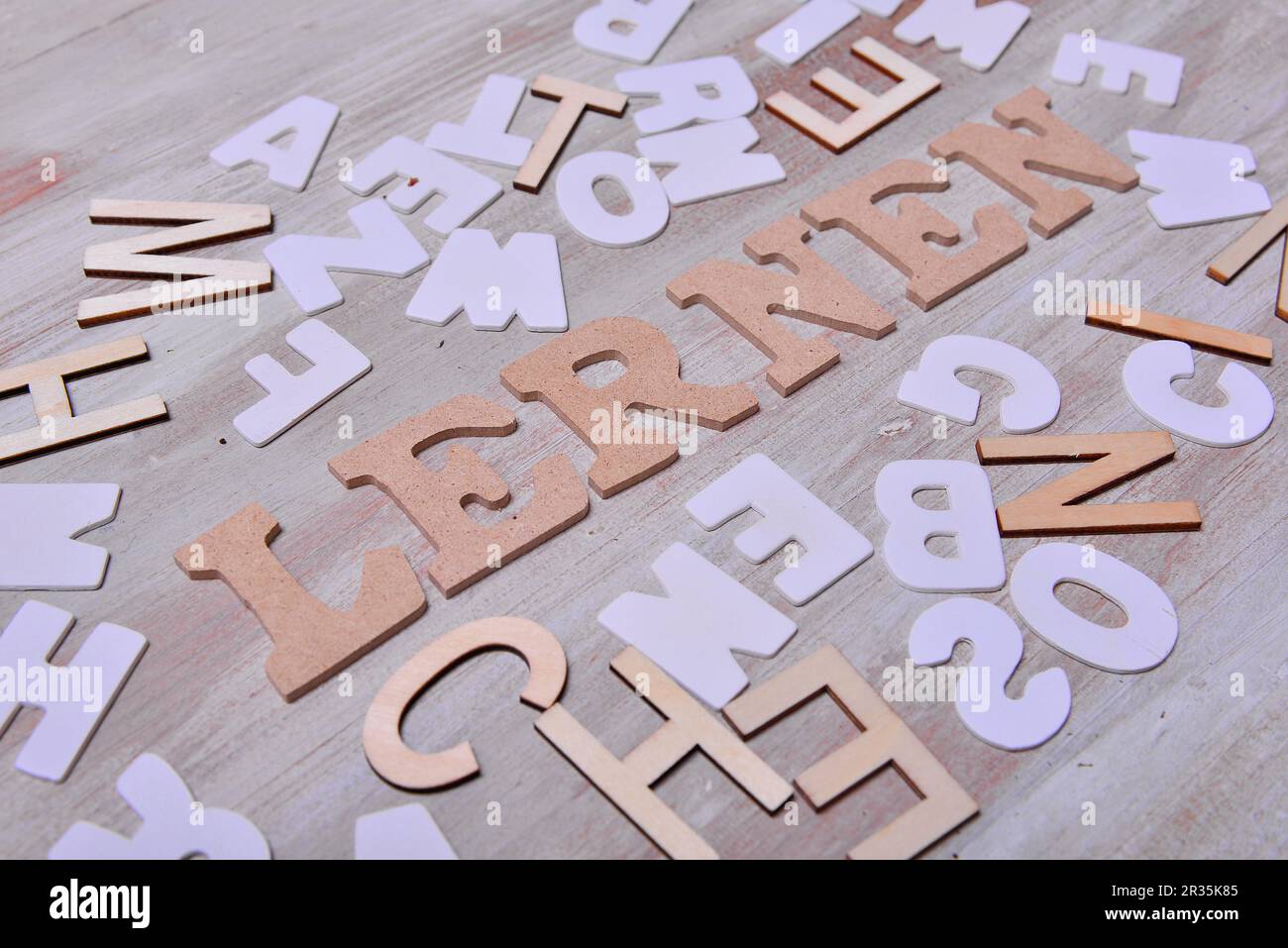 Learning wood letters school language course Stock Photo - Alamy
