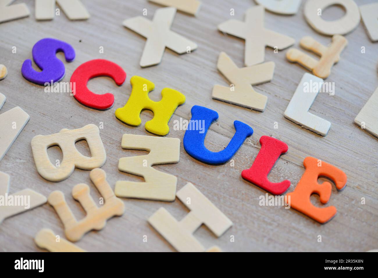 Learning wood letters school language course Stock Photo - Alamy