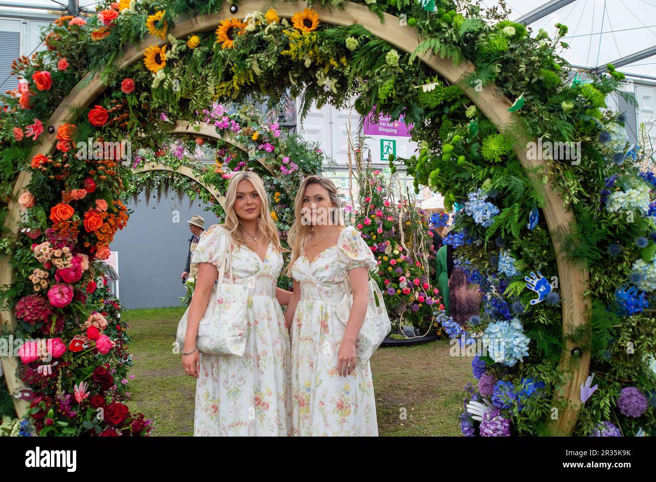 Chelsea, London, UK. 22nd May, 2023. Two girls wearing matching dresses ...
