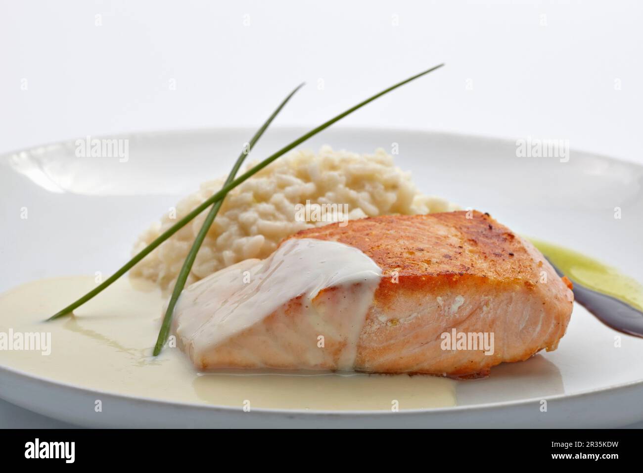 Grilled salmon with risotto Stock Photo - Alamy