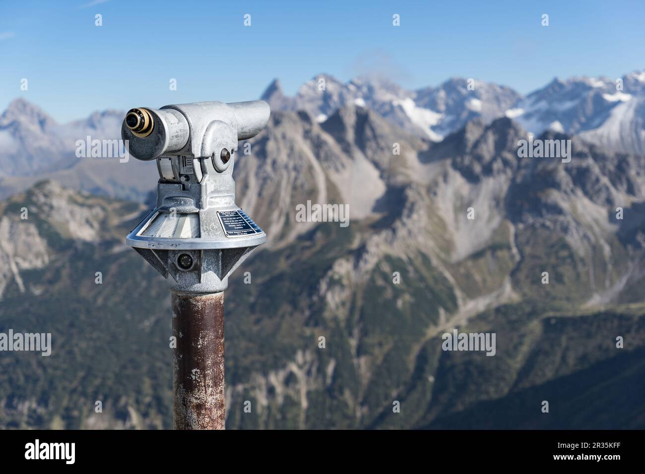 Telescope with mountain range Stock Photo - Alamy