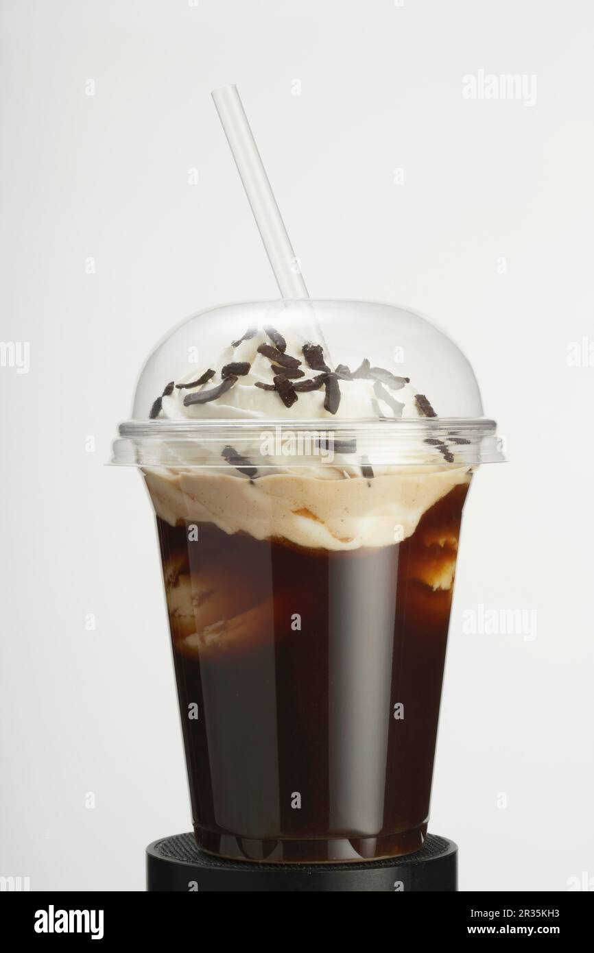 An iced coffee with whipped cream to go Stock Photo - Alamy