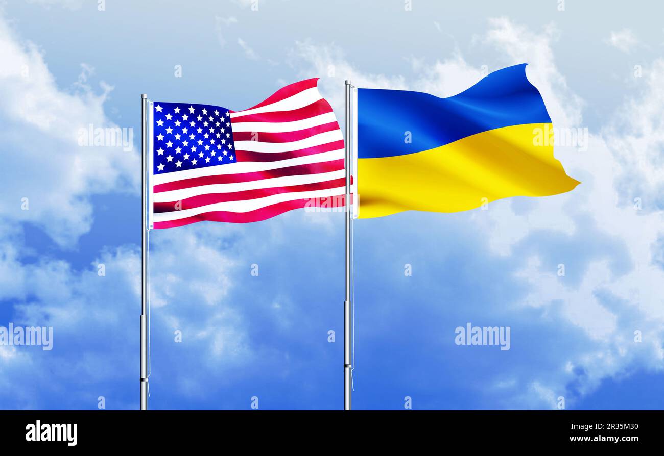 America and Ukraine flags together waving against blue sky Stock Photo ...