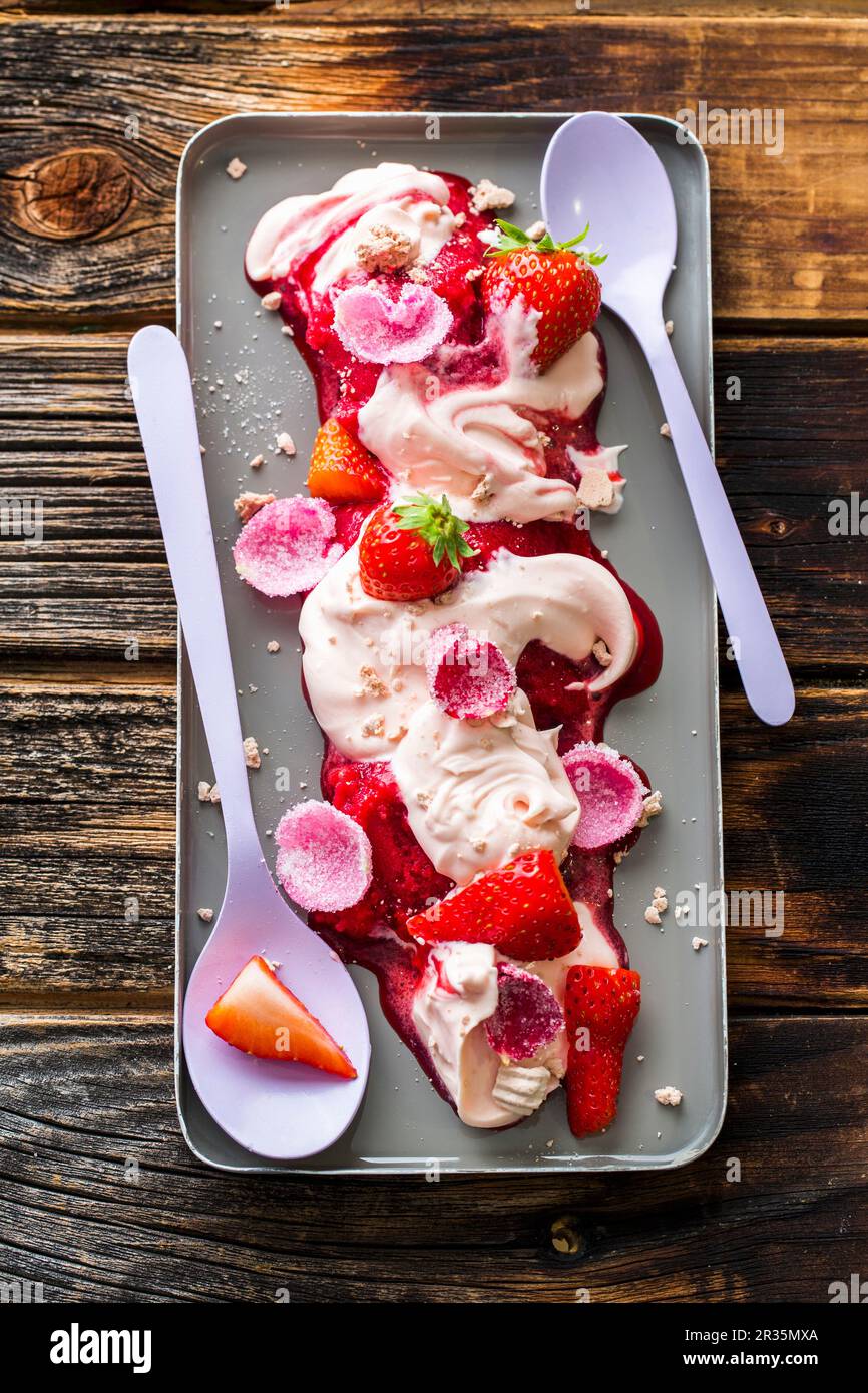 Strawberry Eton Mess with strawberry sorbet and candied rose petals ...