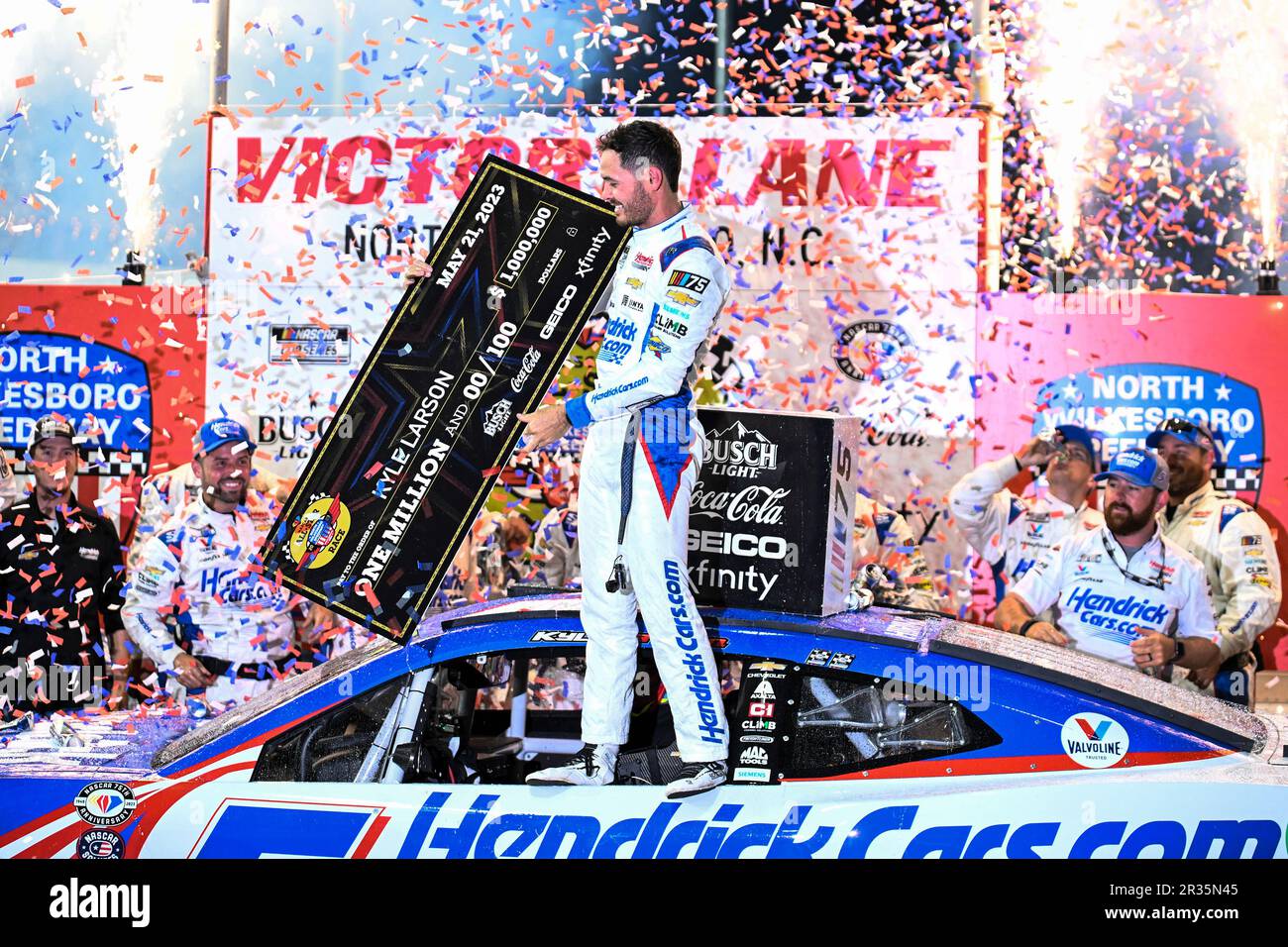 Kyle Larson celebrates in Victory Lane after winning the NASCAR All ...