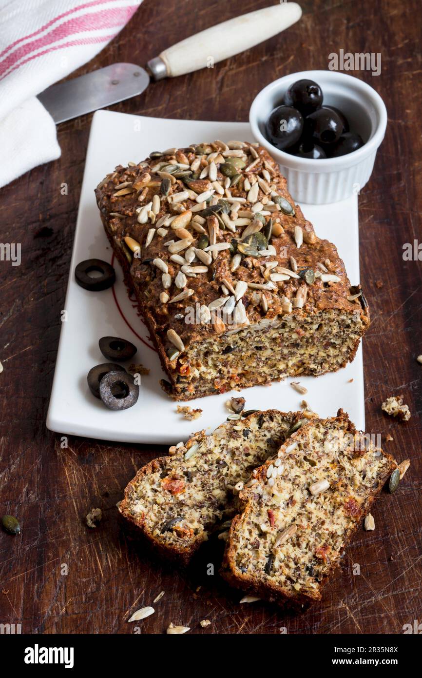 Mediterranean wholemeal bread with olives and sunflower seeds Stock ...