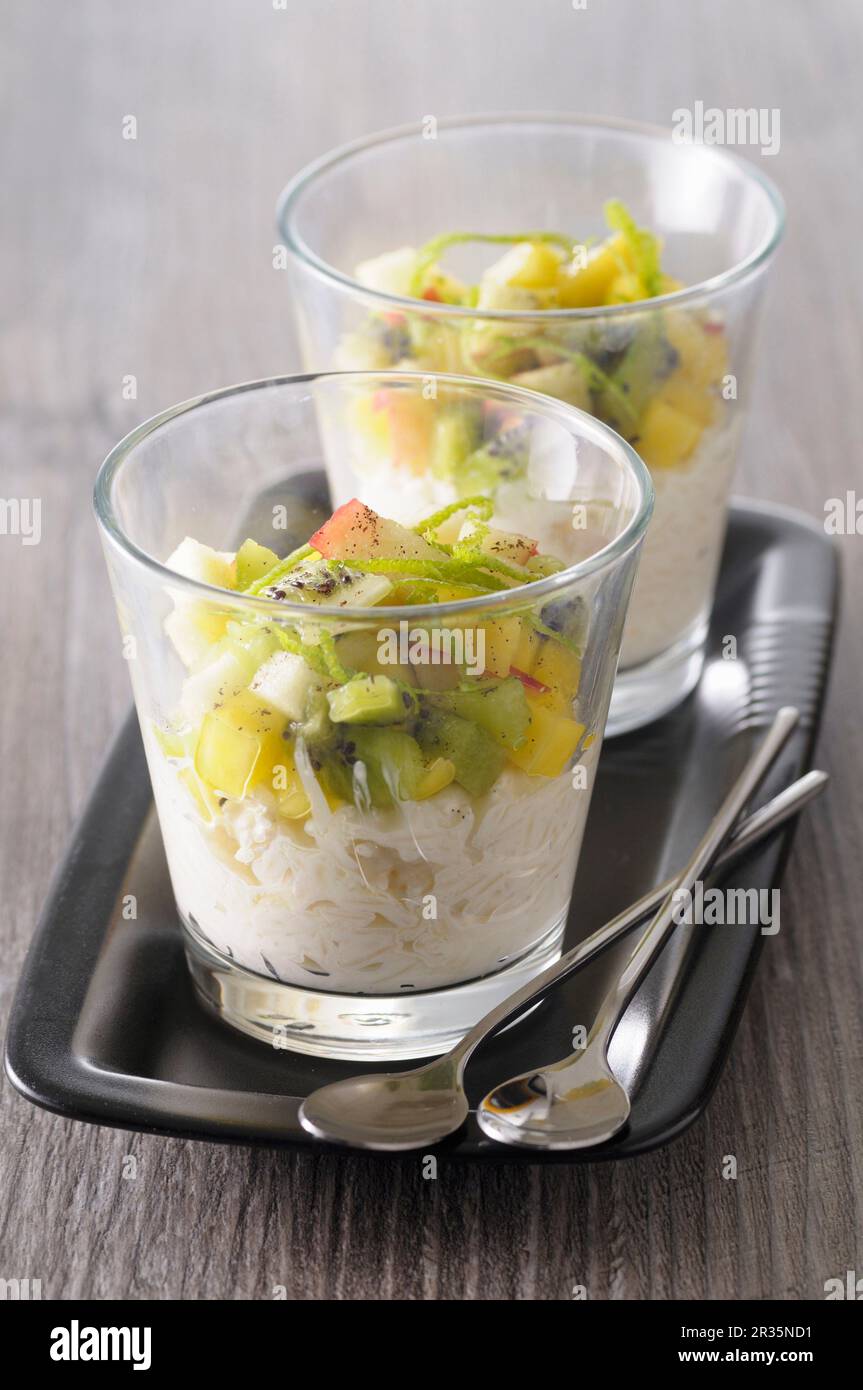 Coconut rice pudding with exotic fruit Stock Photo - Alamy