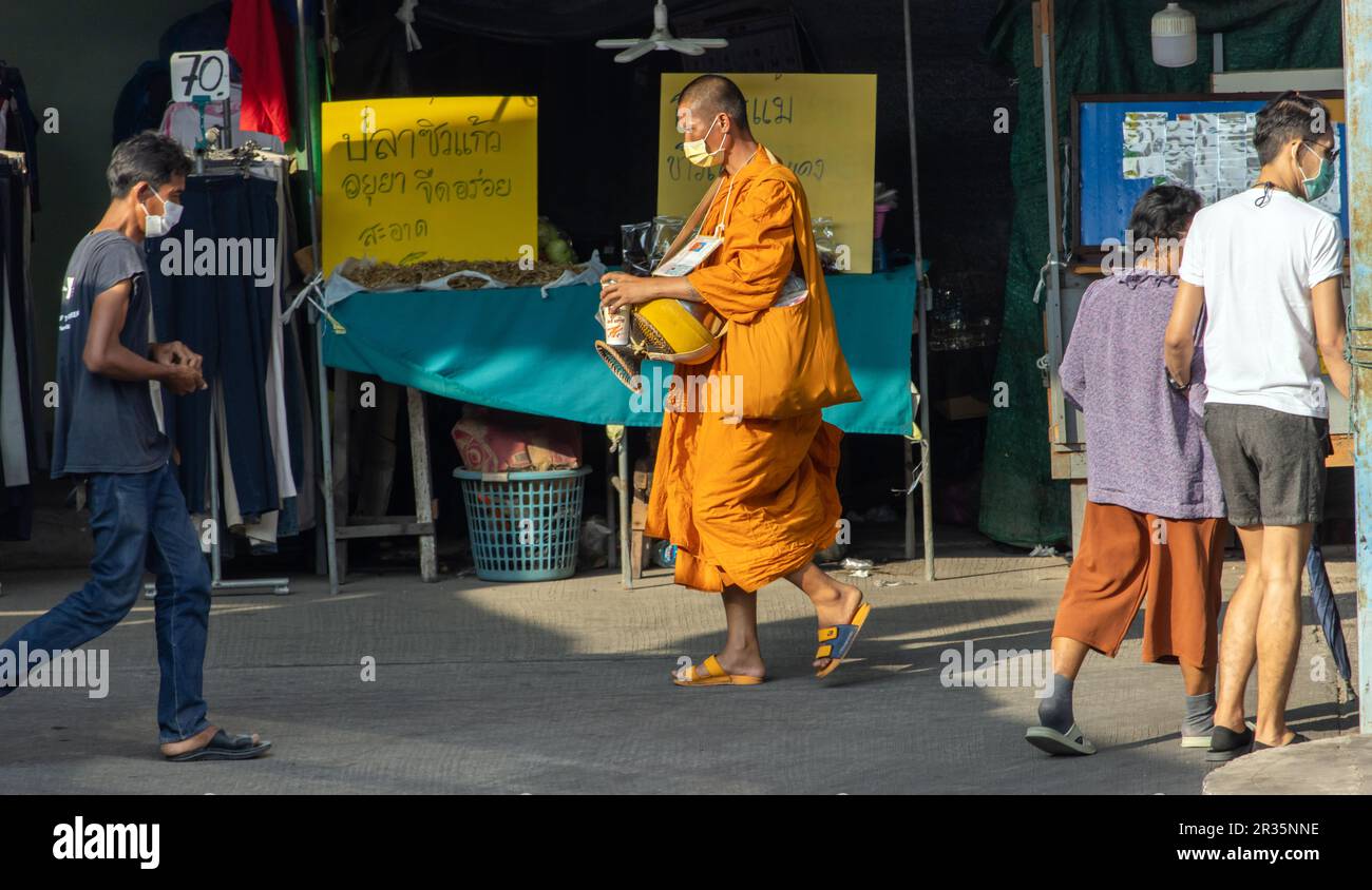 SAMUT PRAKAN, THAILAND, APR 07 2023, A Buddhist monk walks on the ...