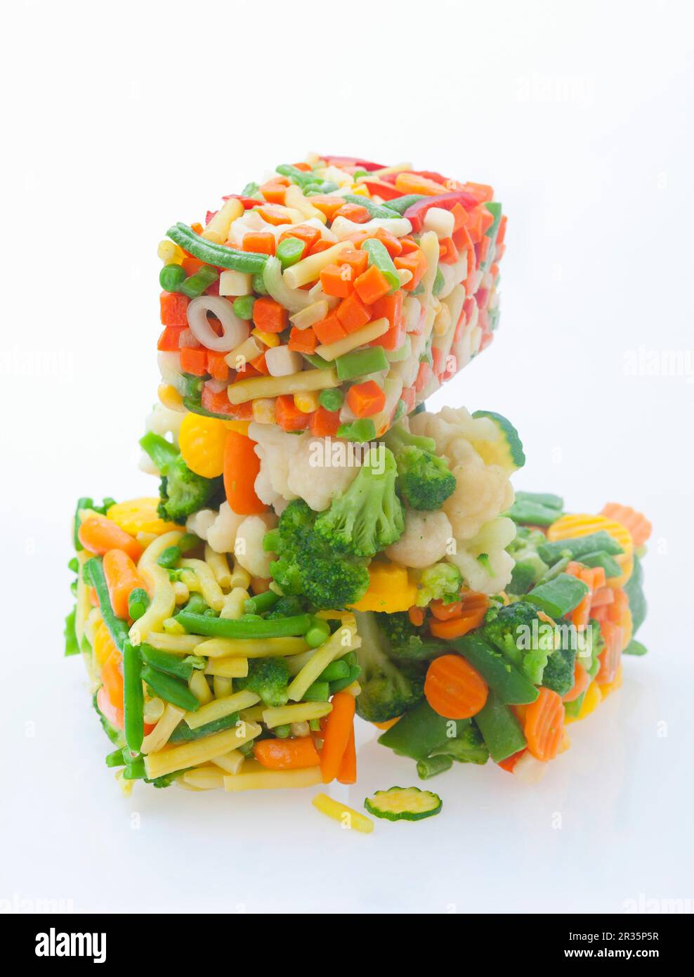 Blocks of frozen vegetables Stock Photo - Alamy