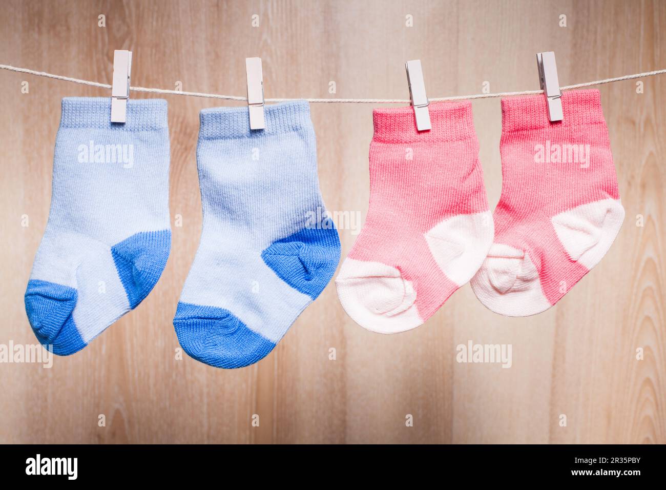 Baby hanging rope hi-res stock photography and images - Alamy