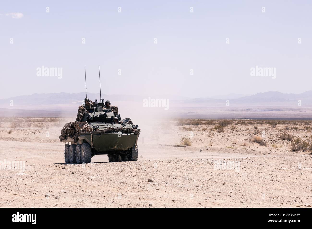 A U.S. Marine with 3rd Light Armored Reconnaissance Battalion, 1st ...
