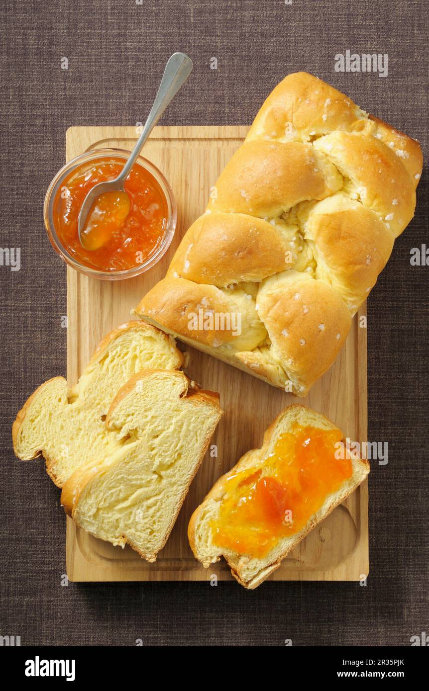 Bread plait with apricot jam Stock Photo - Alamy
