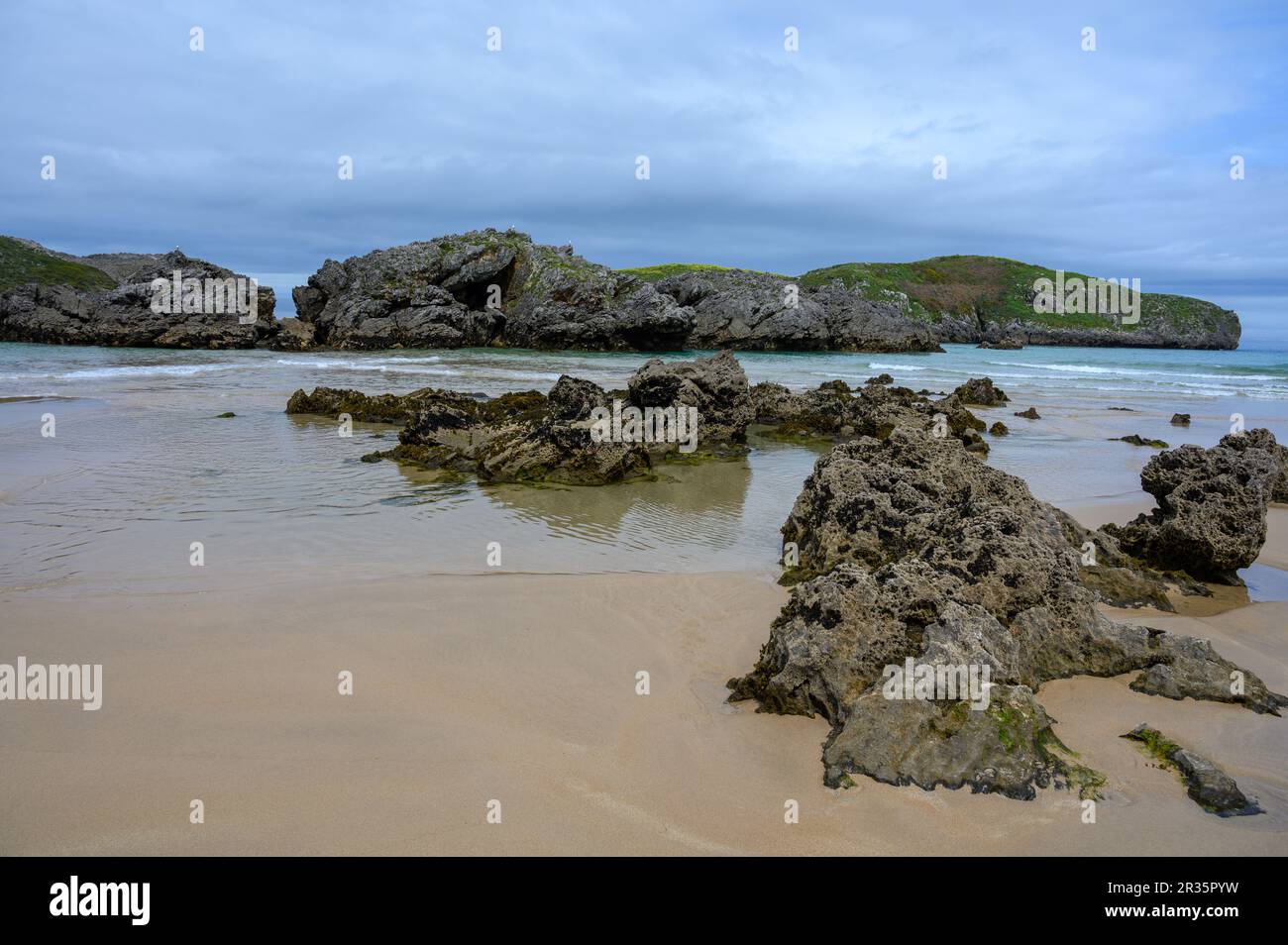 View on rocks on Playa de Borizo in Celorio, Green coast of Asturias ...