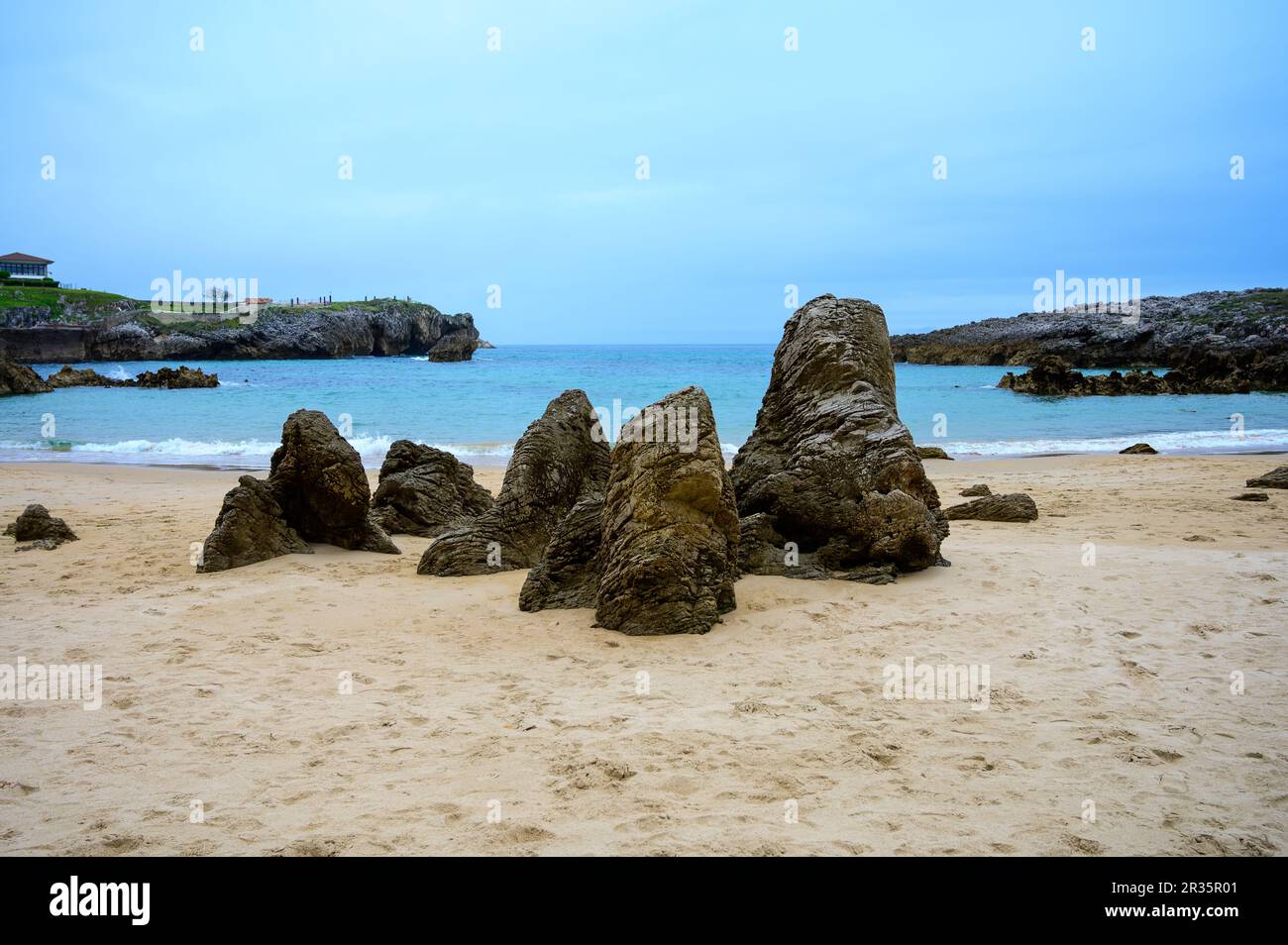 View on rocks on Playa de Toro in Llanes, Green coast of Asturias ...