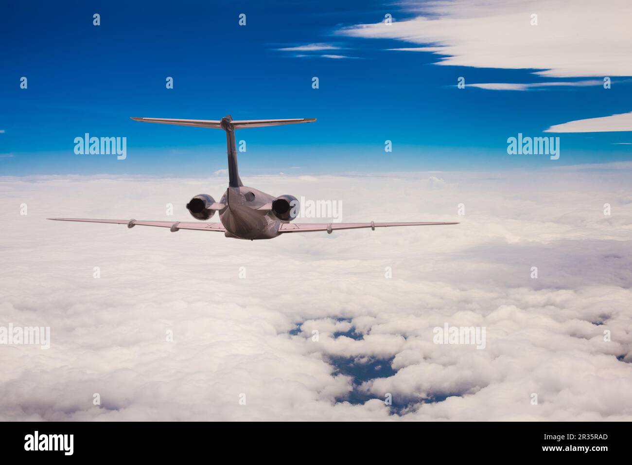 Flying an airplane in morning sun Stock Photo - Alamy