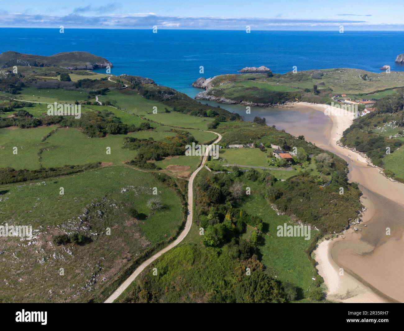Aerial view on Playa de Poo during low tide near Llanes, Green coast of ...