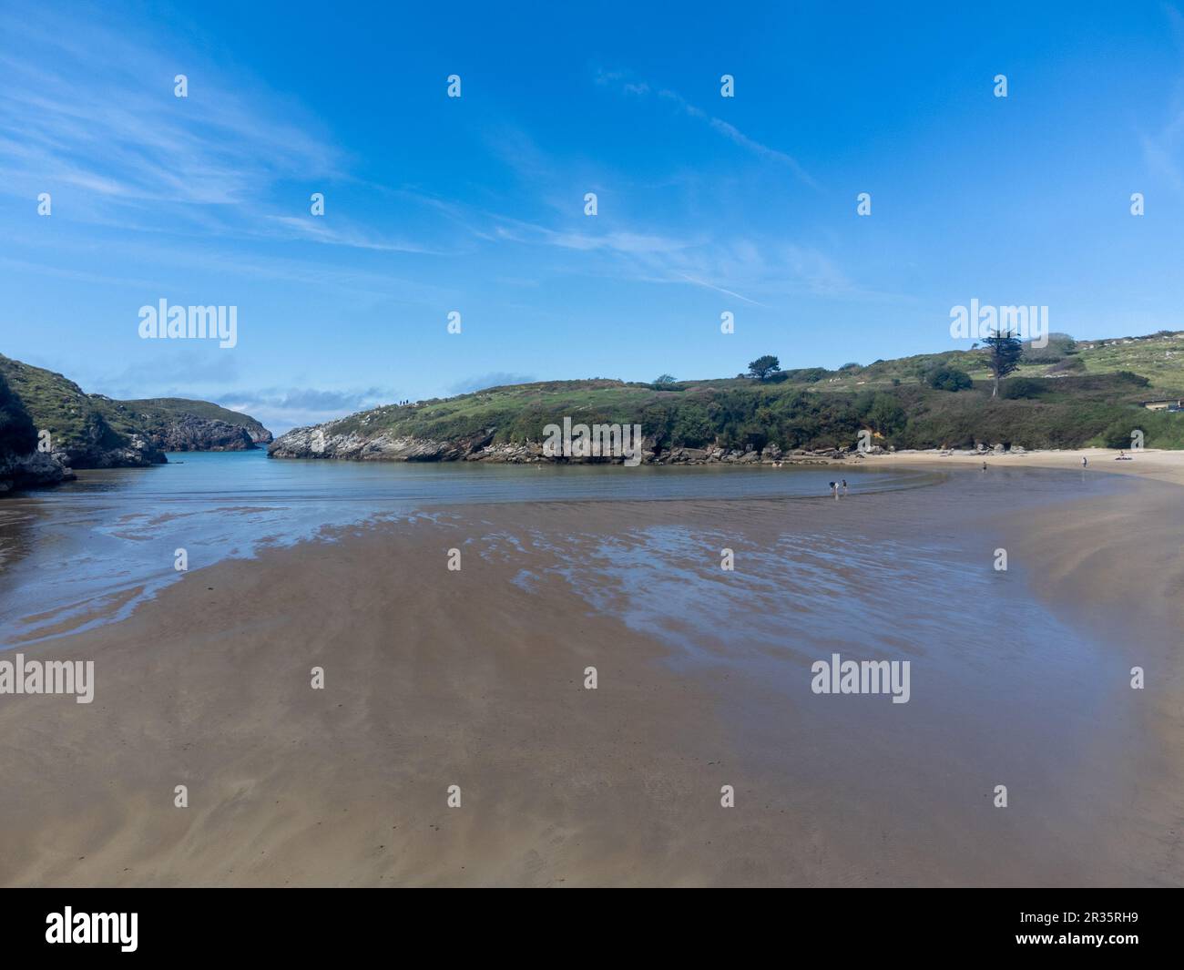 Aerial view on Playa de Poo during low tide near Llanes, Green coast of ...