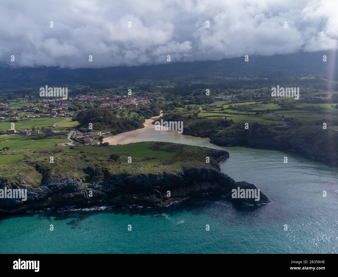 Aerial view on Playa de Poo during low tide near Llanes, Green coast of ...