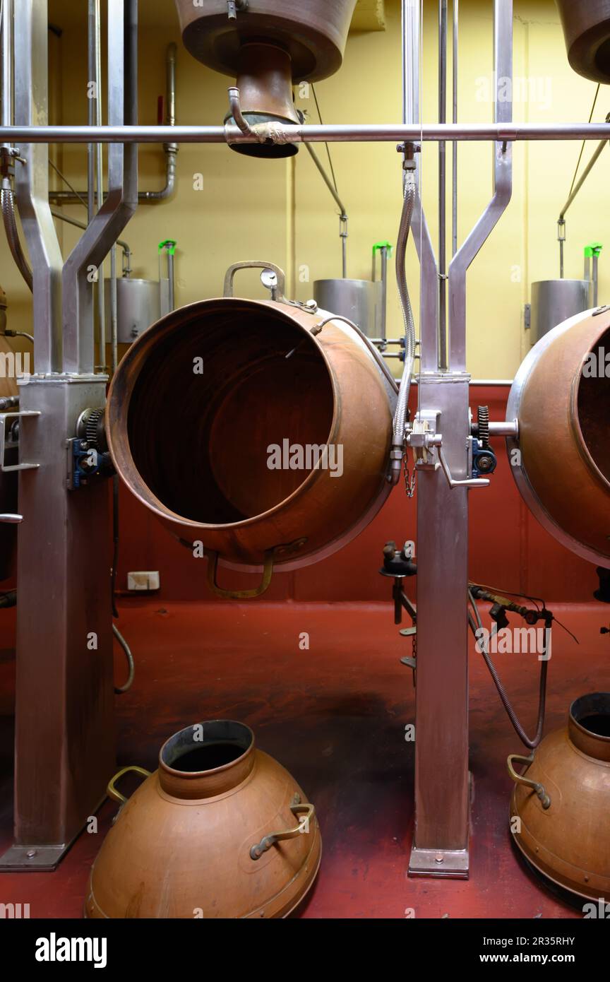 Gin alcoholic drink distillation process in copper tanks in Spanish ...