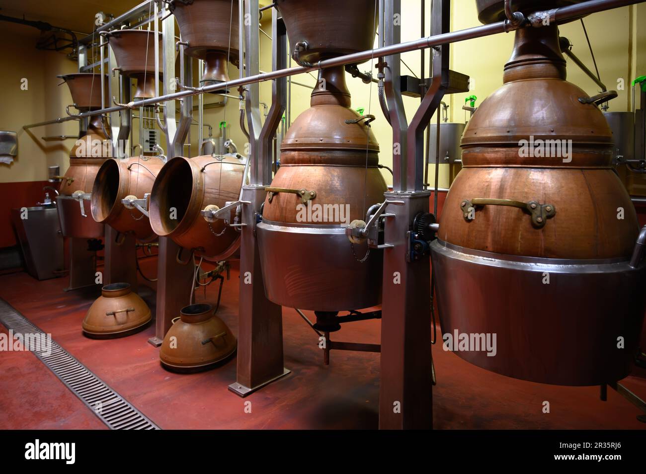 Gin alcoholic drink distillation process in copper tanks in Spanish ...