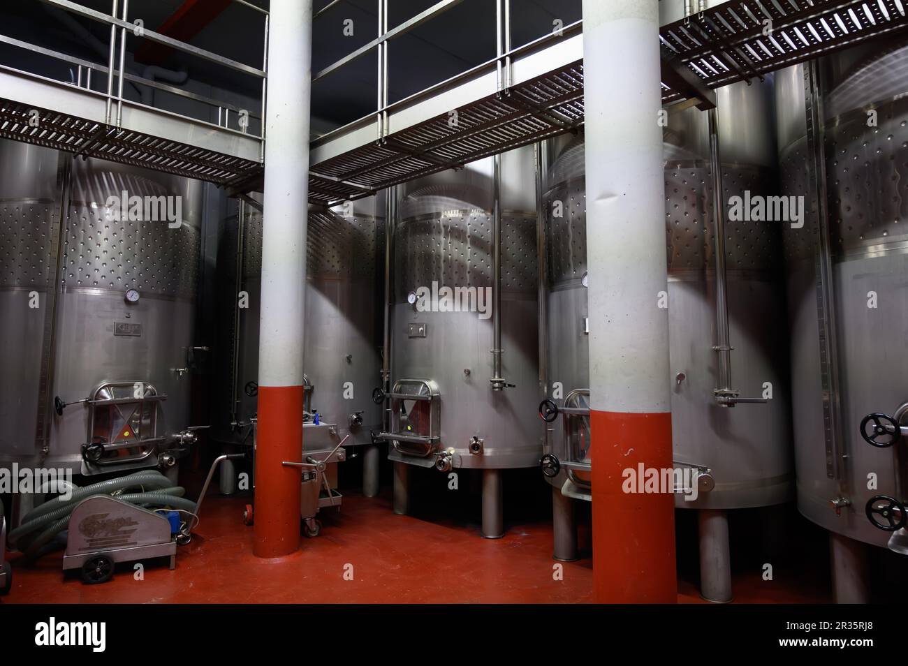 Modern bio wine production factory in Italy, inox steel tanks used for ...