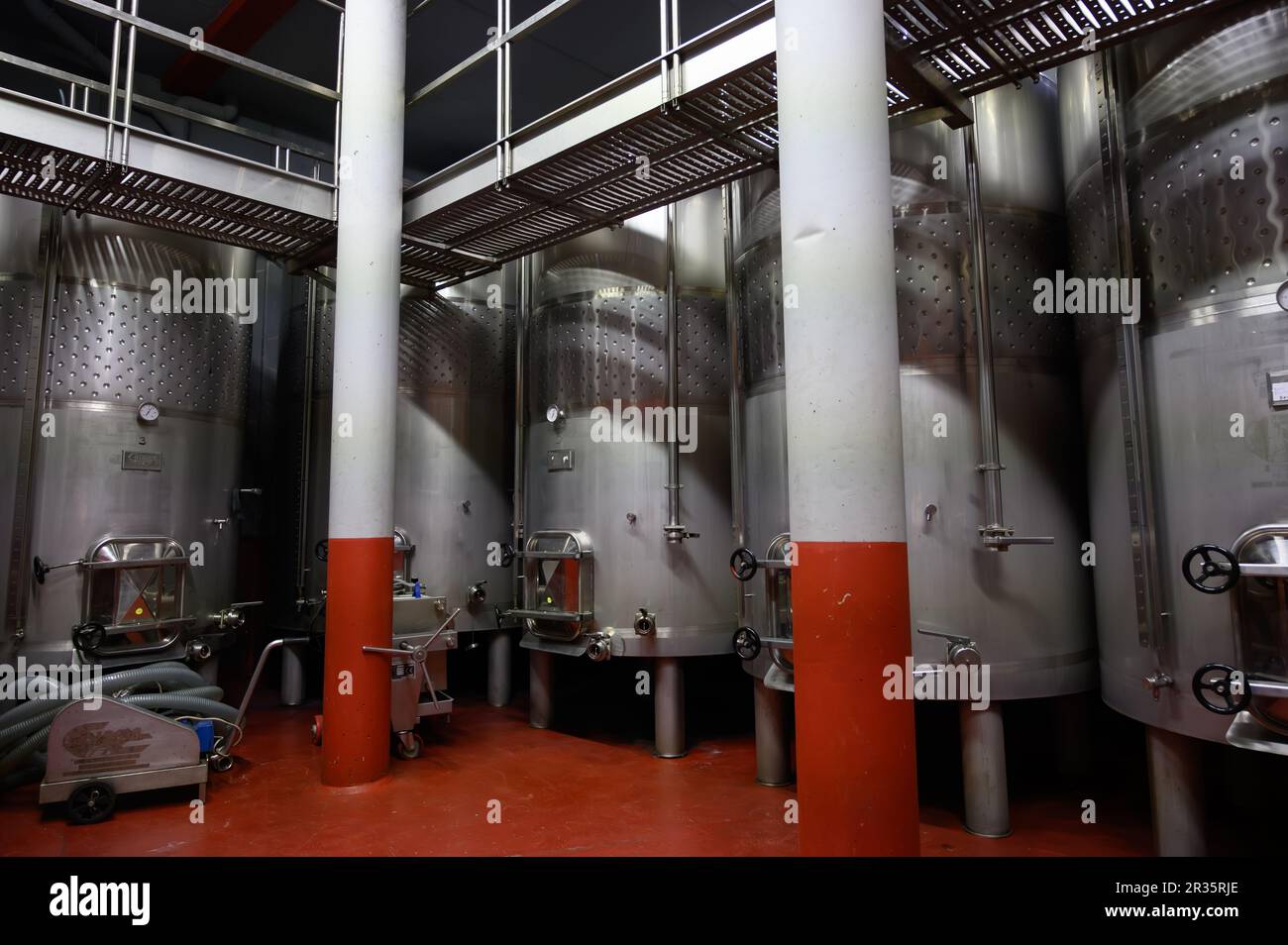 Modern bio wine production factory in Italy, inox steel tanks used for ...