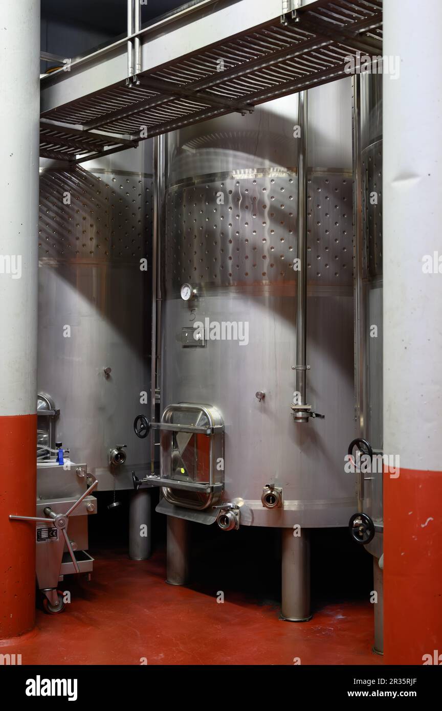 Modern bio wine production factory in Italy, inox steel tanks used for ...