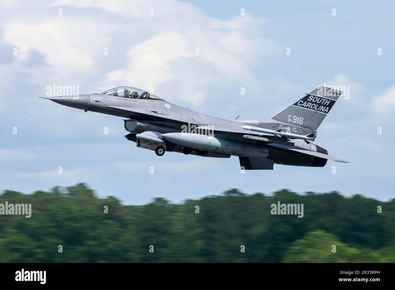 An F-16 Fighting Falcon fighter jet takes off for a training mission ...