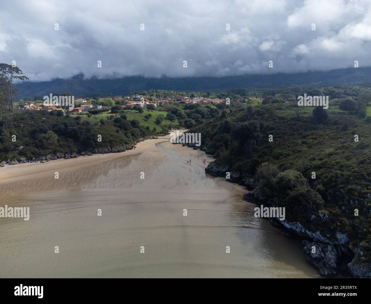 Aerial view on Playa de Poo during low tide near Llanes, Green coast of ...