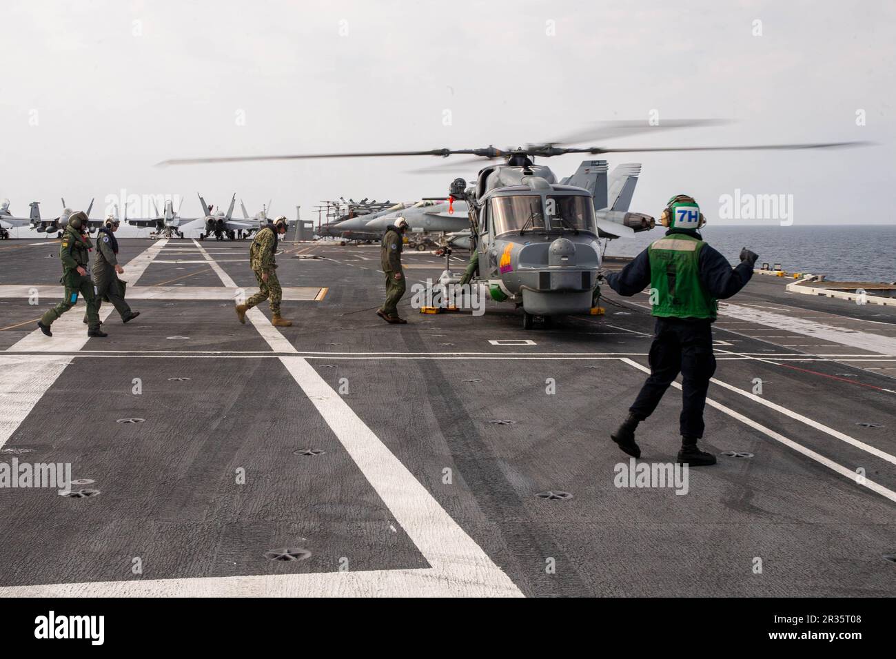 Rear Adm. GregHuffman, Commander, Carrier Strike Group 12, and Rear Adm ...