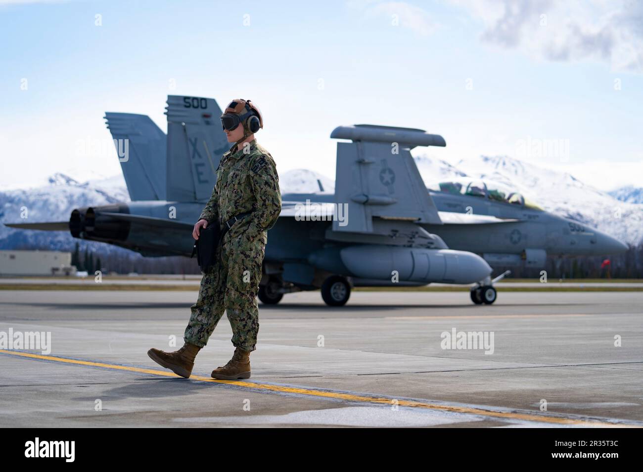 U.S. Navy Aviation Ordnanceman Airman George Degn, assigned to ...
