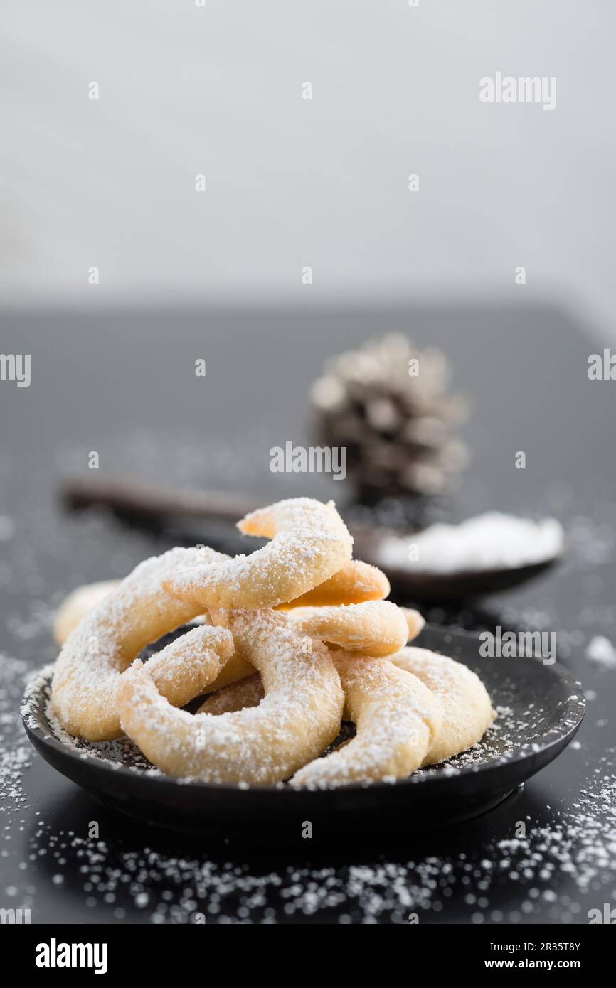 A plate of vanilla crescent biscuits Stock Photo - Alamy